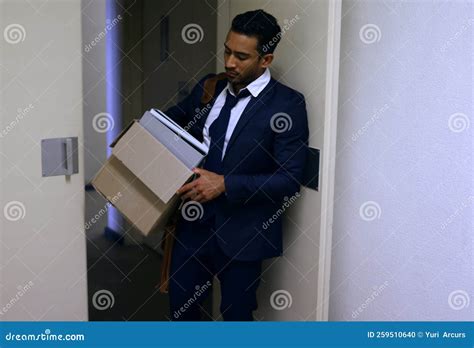 Hes Out The Door A Handsome Young Businessman Looking Depressed After Being Retrenched From