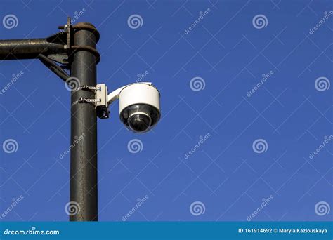 External Cctv Surveillance Cameras Installed On A Tall Pole At A