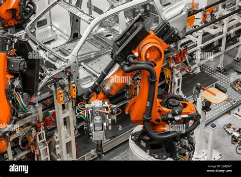 Car Bodies Are On Assembly Line Factory For Production Of Cars Modern Automotive Industry