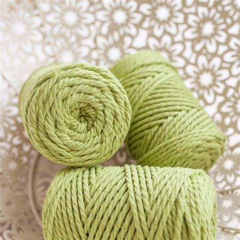 Premium Photo Handmade Macrame Braiding And Cotton Threads In Basket