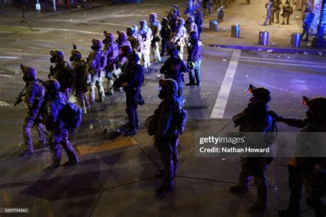 Federal Officers Prepare To Disperse A Crowd Of A Few Hundred News