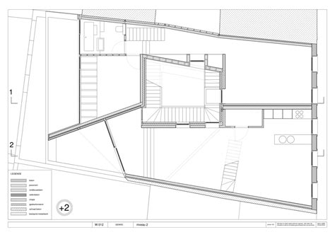 Gewad Apartments By Atelier Vens Vanbelle Feature A Mirrored Atrium