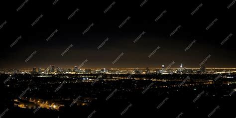 Premium Ai Image Night City Lights In The Distance With Black