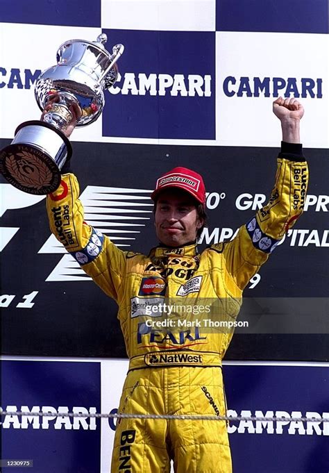 Jordans Heinz Harald Frentzen Of Germany Lifts The Trophy After