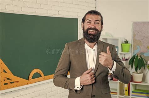 Happiness Male Student Sit In Classroom While Lesson Pass The Exam