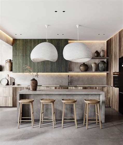 A Modern Kitchen With Two Pendant Lights Hanging From The Ceiling And Three Stools In Front Of