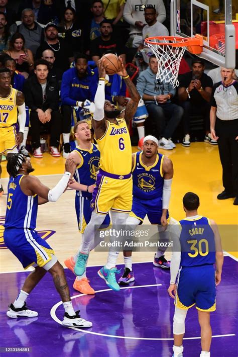 Lebron James Of The Los Angeles Lakers Drives To The Basket During