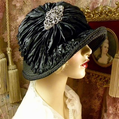 1920s Vintage Style Silky Black And Silver Brooch Cloche Flapper Dress Hat