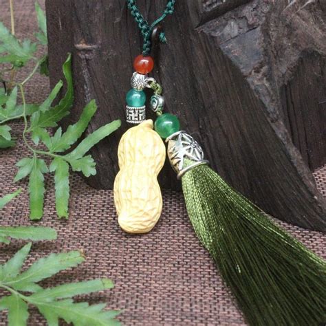 おしゃれな柘植根付 落花生 ストラップ付き メルカリ