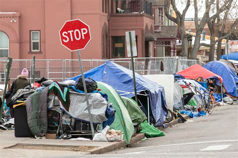 Homeless People On The Streets With Signs