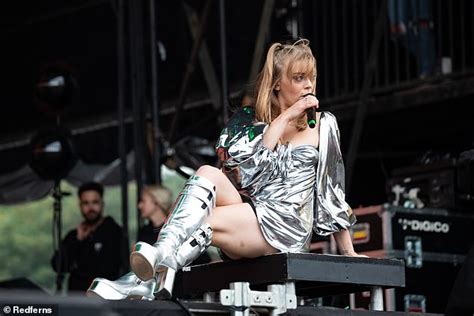 Becky Hill Stuns In Metallic Mini Dress And Knee High Boots At Leeds