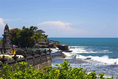 Download Caption A Breathtaking View Of Bali Islands Beach With Crystal Clear Water And White