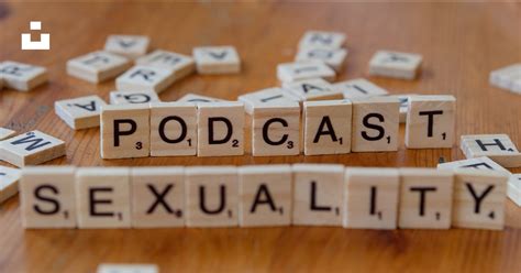 A Wooden Table Topped With Scrabble Tiles That Spell Out The Word Sex