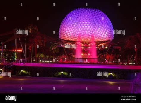 The World Showcase Lake And Spaceshipe Earth Dome At Night Epcot