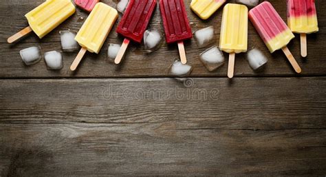 Some Popsicles On Fresh Ice Cubes Popsicle Background On Table Stock Illustration