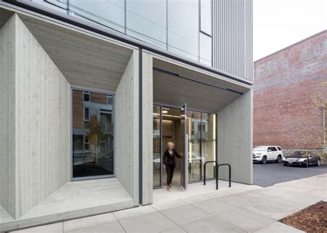 Glass Facade Reveals Timber Structure Of Portland Office Building