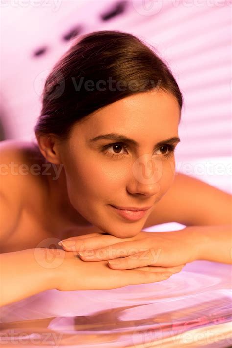 Solarium Treatment Close Up Of Attractive Young Woman Lying On Tanning
