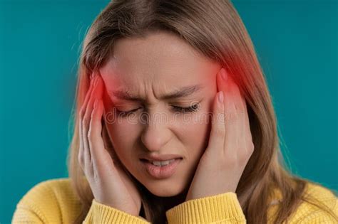 Portrait Of Beautiful Suffering Woman Having Headache Studio Portrait