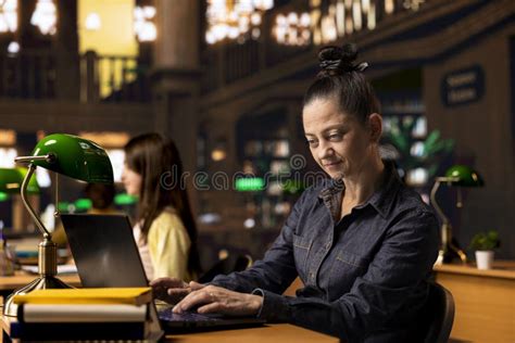 Educator Preparing Documents And Learning Materials For Her Teaching