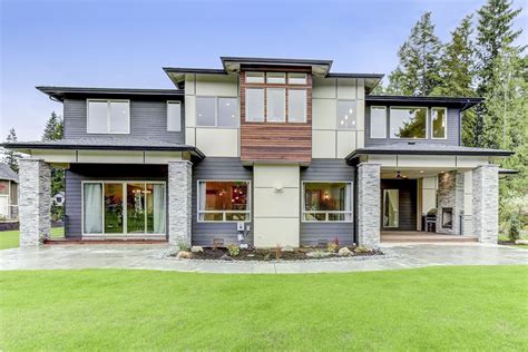Two Story Hip Roofed Contemporary Home Plan With Den 23847jd