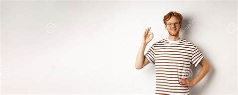 Confident Smiling Man With Red Hair Assuring You Showing Ok Sign Guarantee Quality