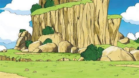 Dragon Ball Art A Cartoon Scene With Rocks And Grass In The Foreground