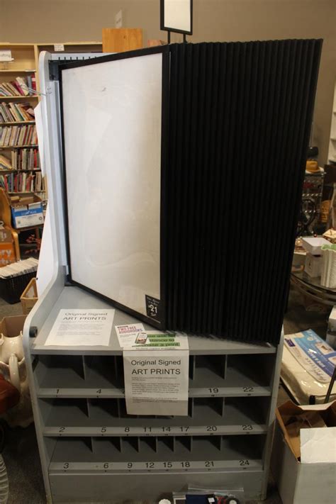 Poster Rack Display With Storage