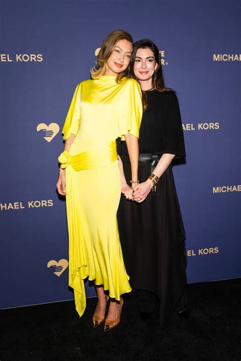 Gigi Hadid Looks Sensational In Bright Yellow Gown As She Hugs Pal Anne