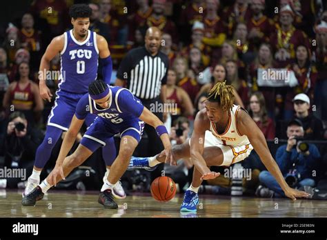 Tcu Forward David Punch 15 And Iowa State Center Dishon Jackson 1 Chase Down A Loose Ball
