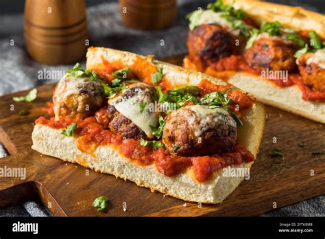 Homemade Cheesy Meatball Sub Sandwich With Marinara And Provolone Stock