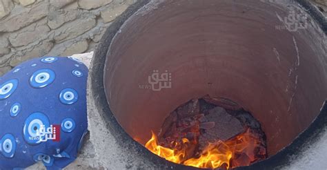 خبز تنور الطين طعم مميز ورائحة شهية وعودة بالزمن صور شفق نيوز