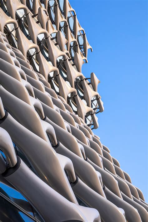 Morphosis Weaves Textile Research Facility Facade From Reinforced Fibre