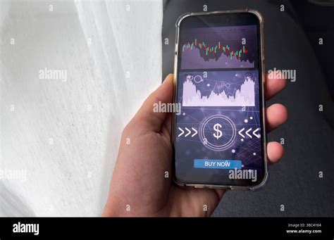 Businessmen Work With Stock Market Investments Using Smartphone To