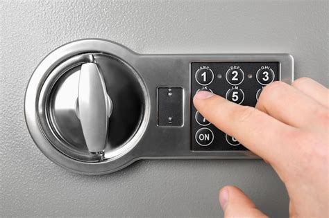 Premium Photo Man Opening Steel Safe With Electronic Combination Lock Closeup