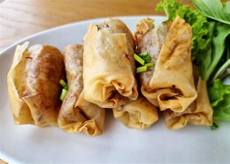 Premium Photo Vietnamese Fried Spring Rolls Cha Gio Chay With Vegetables On A White Plate