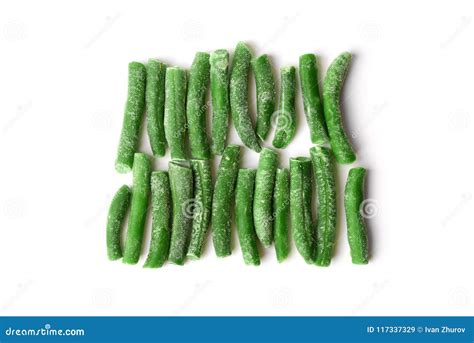 Frozen String Beans Are Arranged In Two Rows Isolated On A White