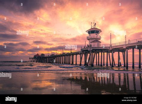Dramatic Sunset At Huntington Beach Pier In Los Angeles California
