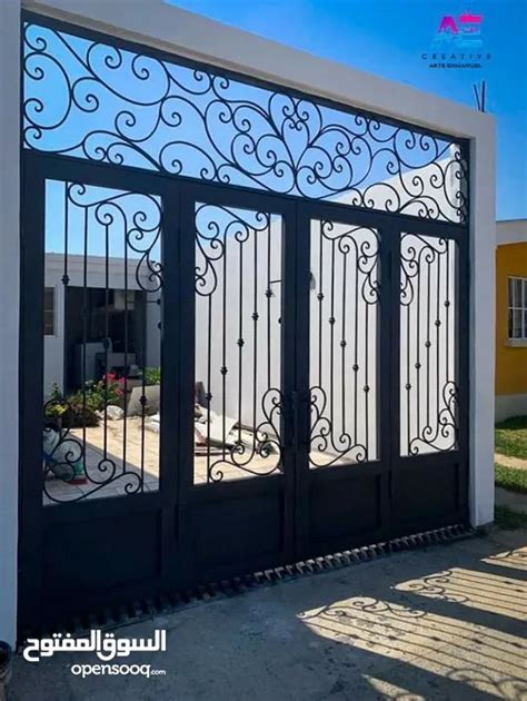 ابواب حديد ابواب المنيوم مطعم بخشب حمايات شبابيك دربزين كرميد 231495900 السوق المفتوح