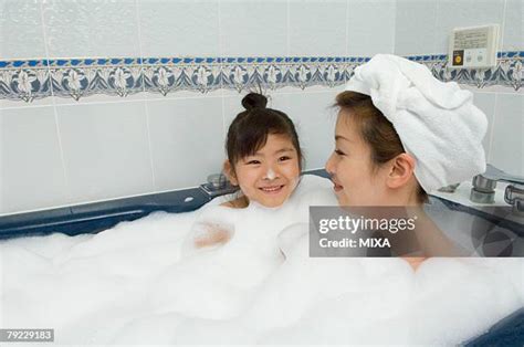 Mother Daughter Taking A Bath Photos And Premium High Res Pictures