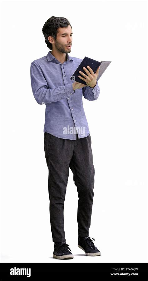 Young Man In Full Growth Isolated On White Background Looking At Paper