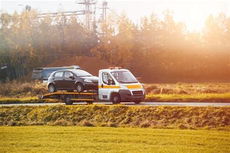 Premium Photo Flatbed Transporter On The Highway