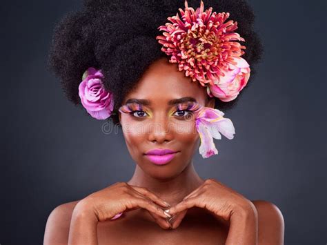 Makeup Flowers And Portrait Of Black Woman In Studio For Beauty