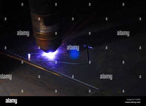 Laser Cutting Torch Machine In An Industrial Plant Cuts Sheet Metal