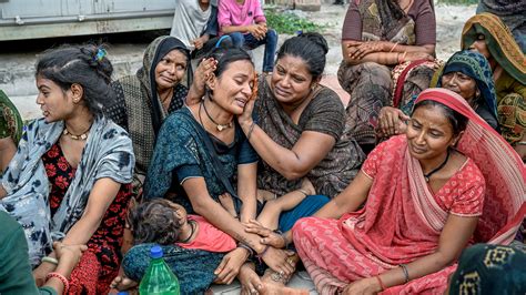 Grieving Relatives Of India Air Crash Victims Wait For Bodies To Be