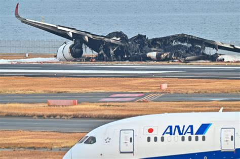Japan Crash Coastguard Instructed To Hold Short Of Runway Before