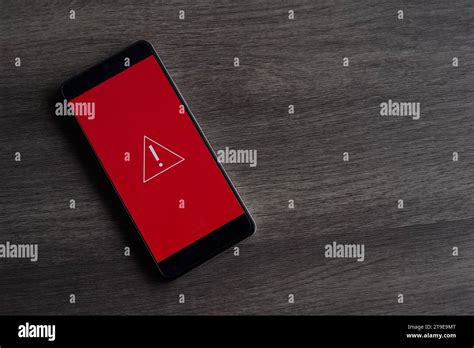 Smartphone With Triangle Caution Warning Icon Copy Space For Text System Error Malware And