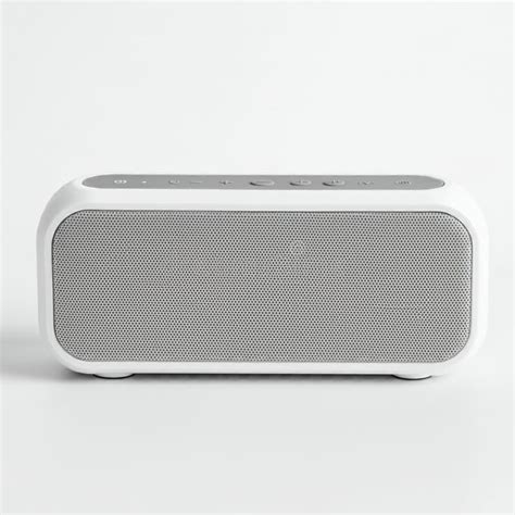 White Rectangular Bluetooth Speaker With Rounded Edges Featuring A