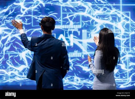 Engineer Wearing Vr Headset Looking At Hologram Of Artificial Intelligence Human Brain