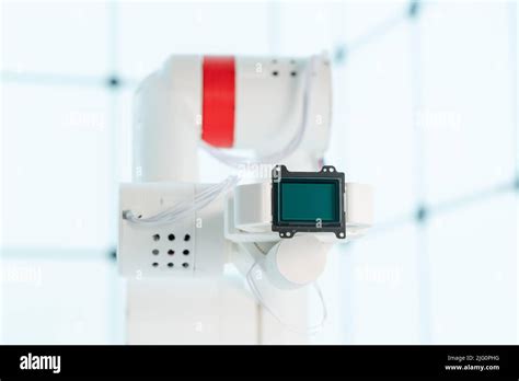 robot arm with ccd and cmos matrix image sensor in the manipulator