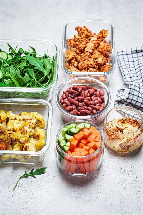 Vegan Meal Prep Containers With Marinated Tofu Beans Baked Vegetables